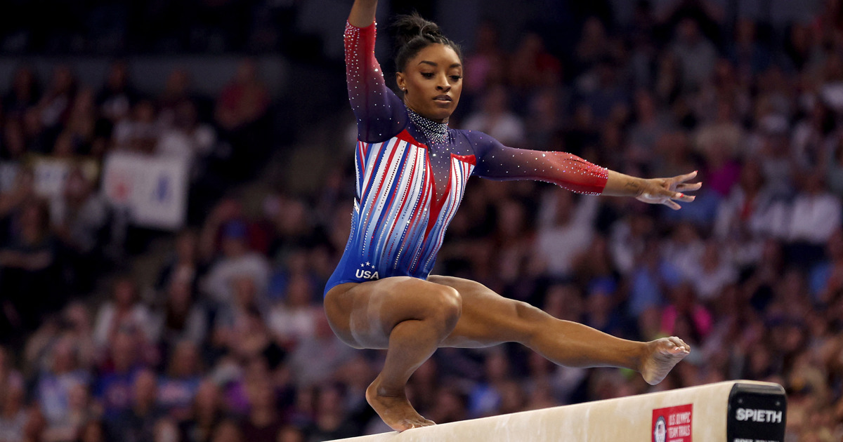 Biles eyes Olympic gymnastics glory as Marchand cruises in the pool