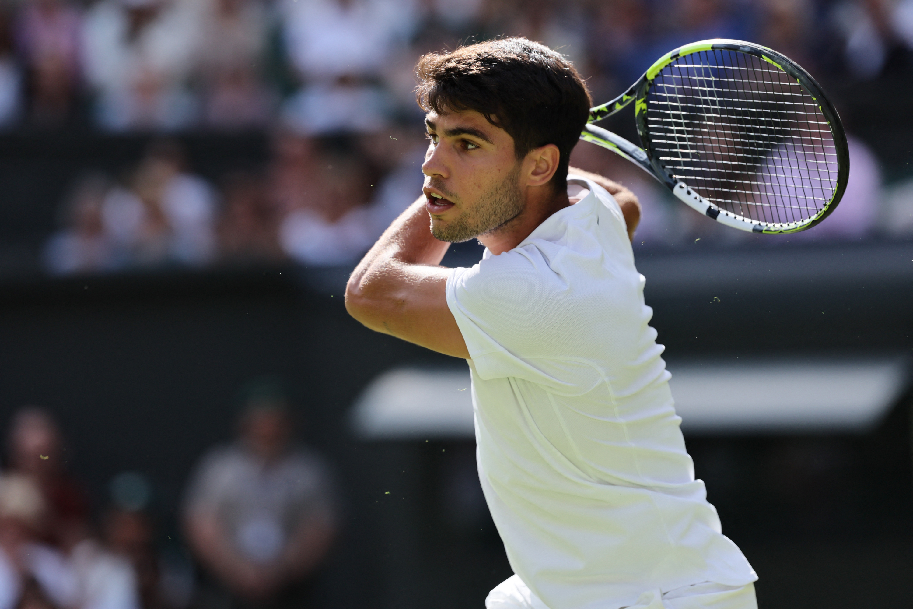 Smiling through: Alcaraz won't let Wimbledon defeat get him down
