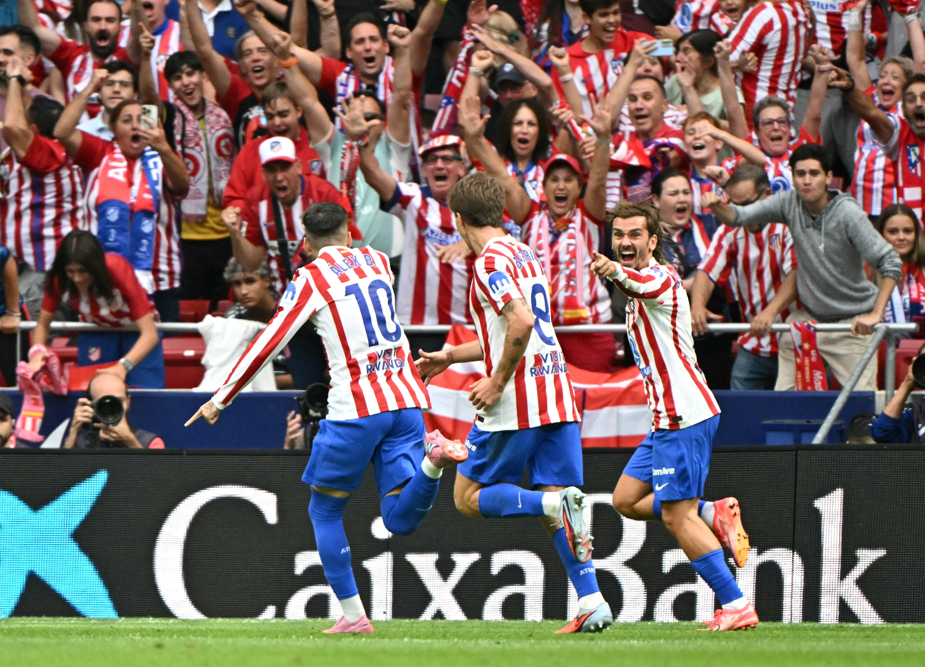 Atletico thrash Liga leaders Real Madrid in gripping derby