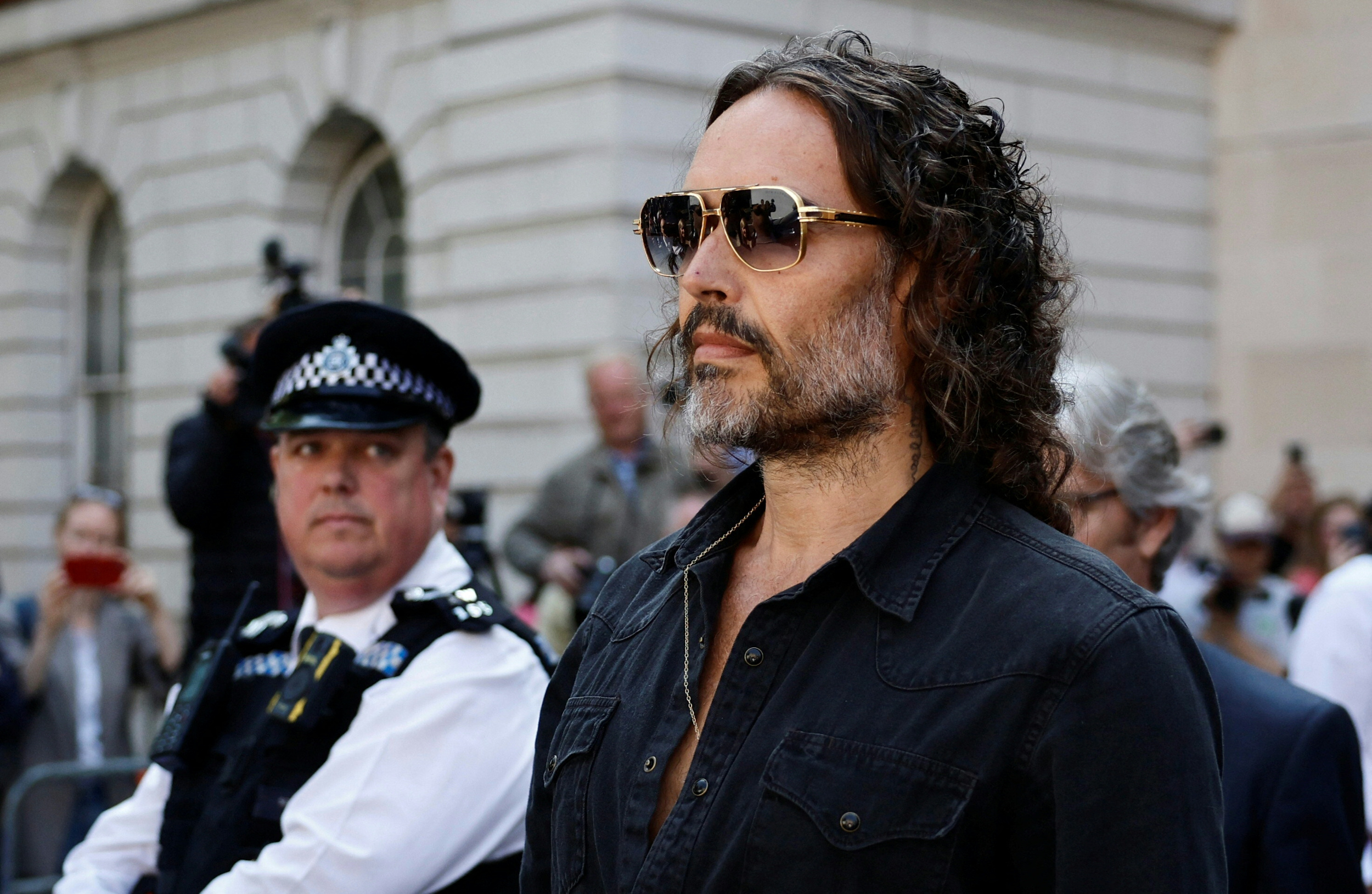 Comedian Russell Brand pleads not guilty to rape, sexual assault charges