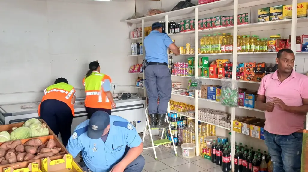 Maile cautions spaza shop owners against paying bogus inspectors Maile cautions spaza shop owners against paying bogus inspectors