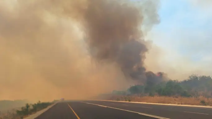 Stanford fire: Homes threatened as strong winds hamper firefighting crews