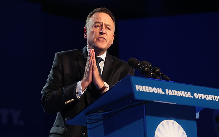 Trump heads into Davos storm, with an eye on home