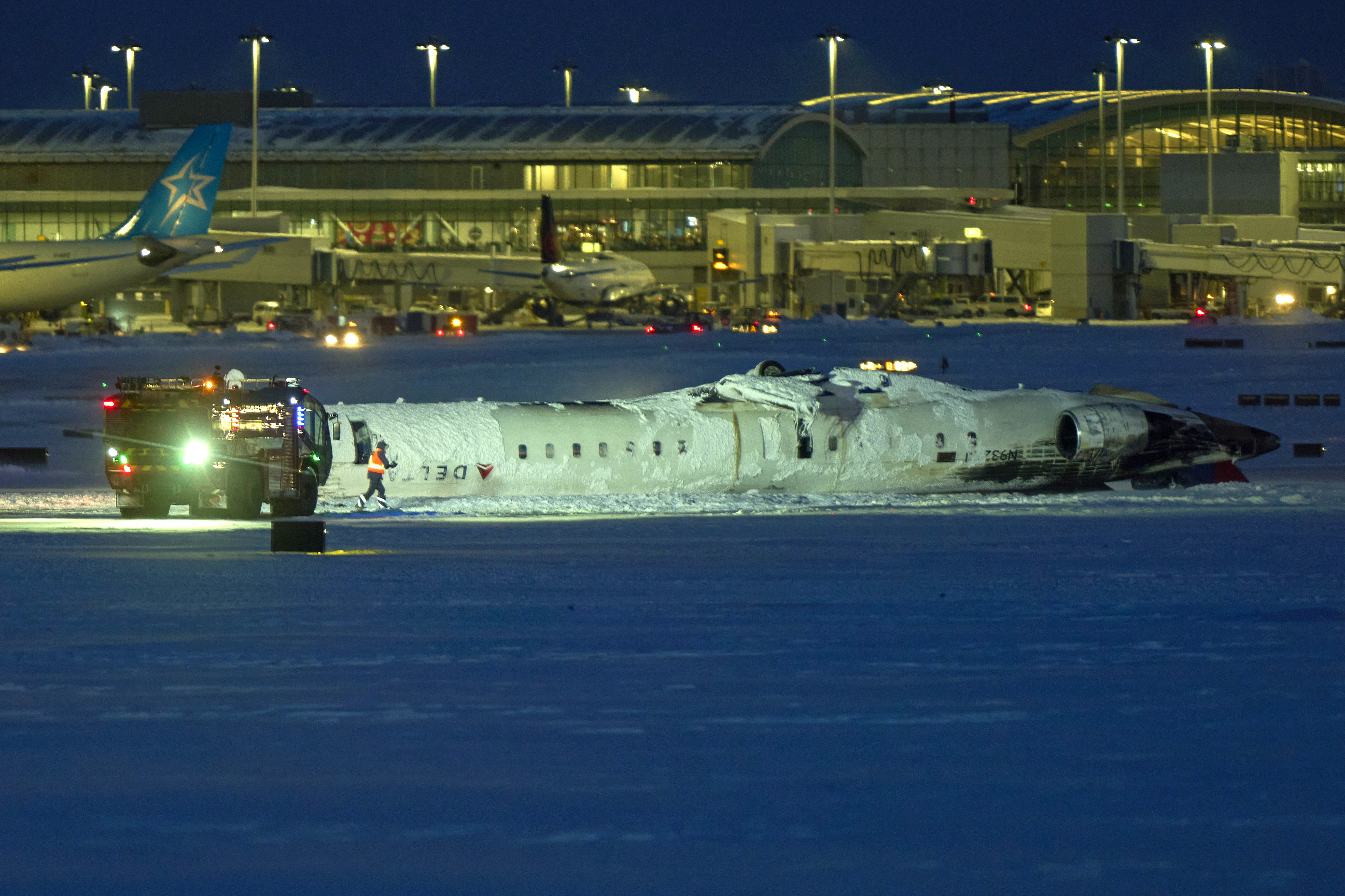 Delta plane flips upside down in Toronto crash, at least 18 injured