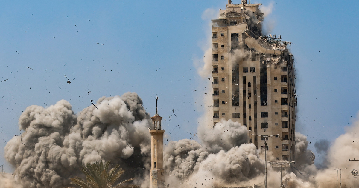 Israel flattens Gaza City high-rise as it tells residents to flee