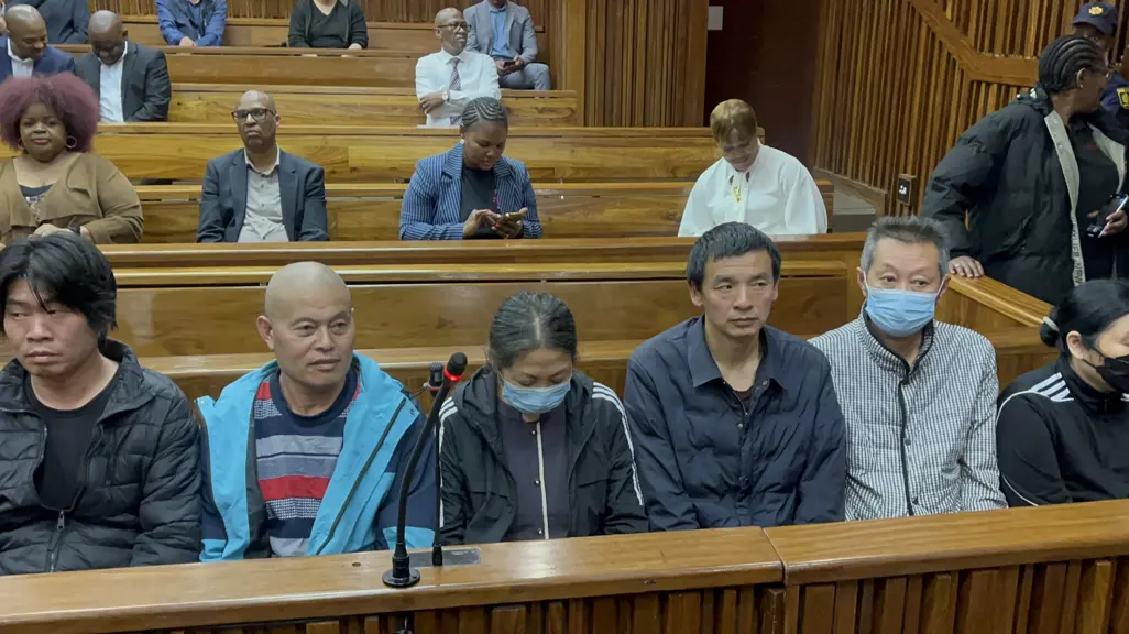 Chaos erupts in court after sentencing of 7 Chinese nationals