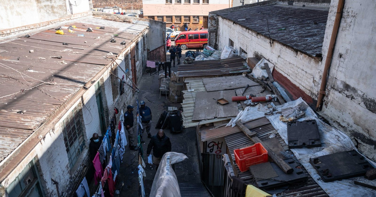 Residents of hijacked Joburg buildings want govt to improve their ...