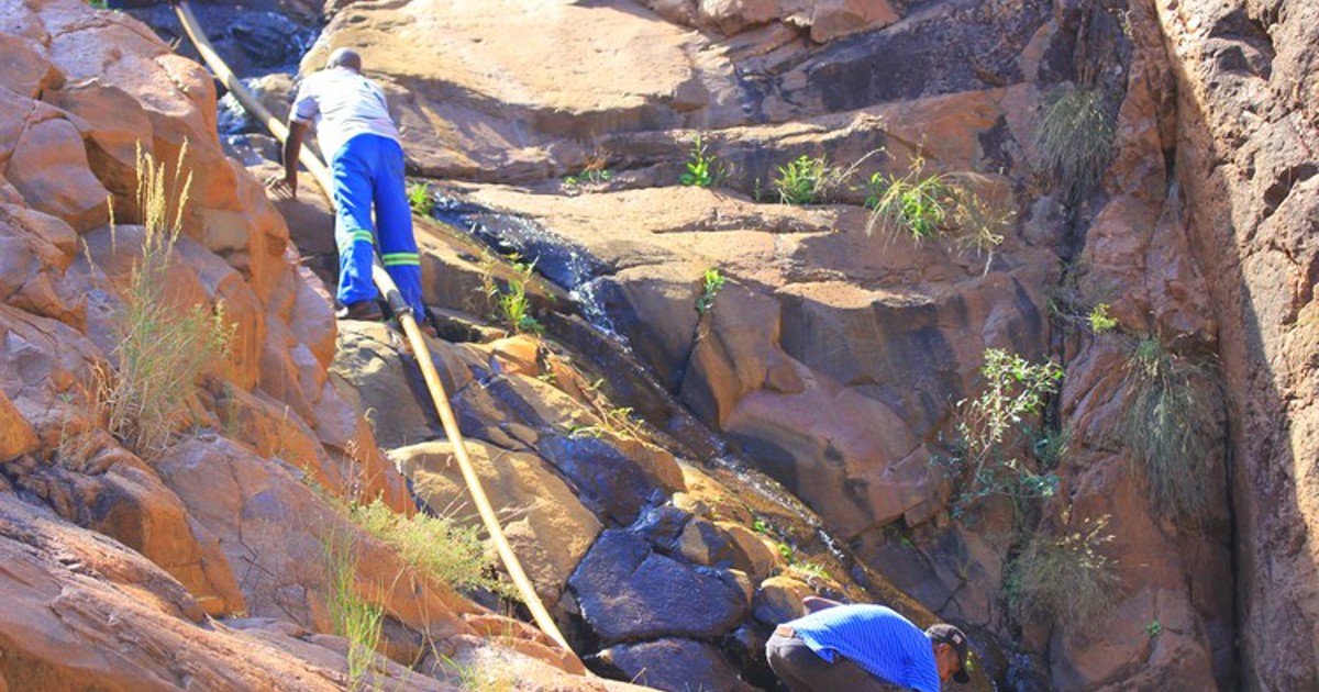 Tired of waiting, Limpopo villagers lay their own water pipes