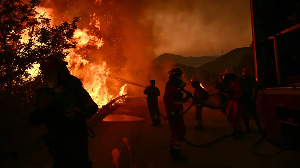 Thousands battle Greece fires as heatwave bakes Europe
