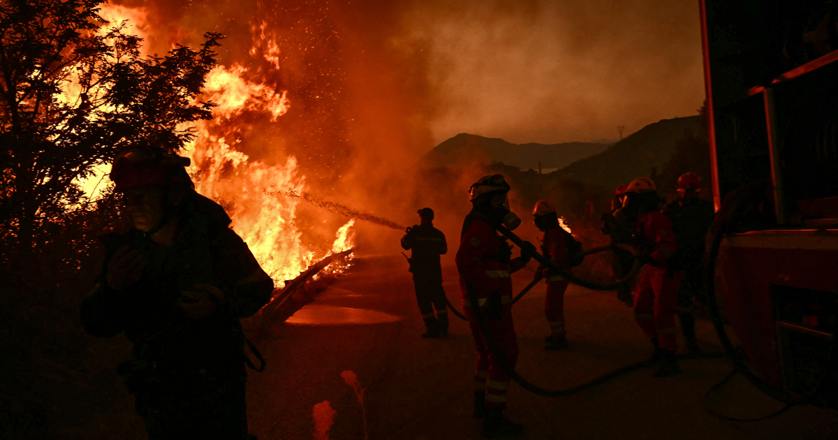 Thousands battle Greece fires as heatwave bakes Europe